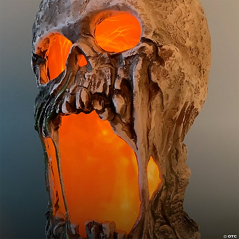 12" Flaming Rotted Skull Animated Prop | Halloween Express