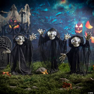 23 1/2" Light-Up Eyes Yard Stake Grinning Reapers Set | Halloween Express